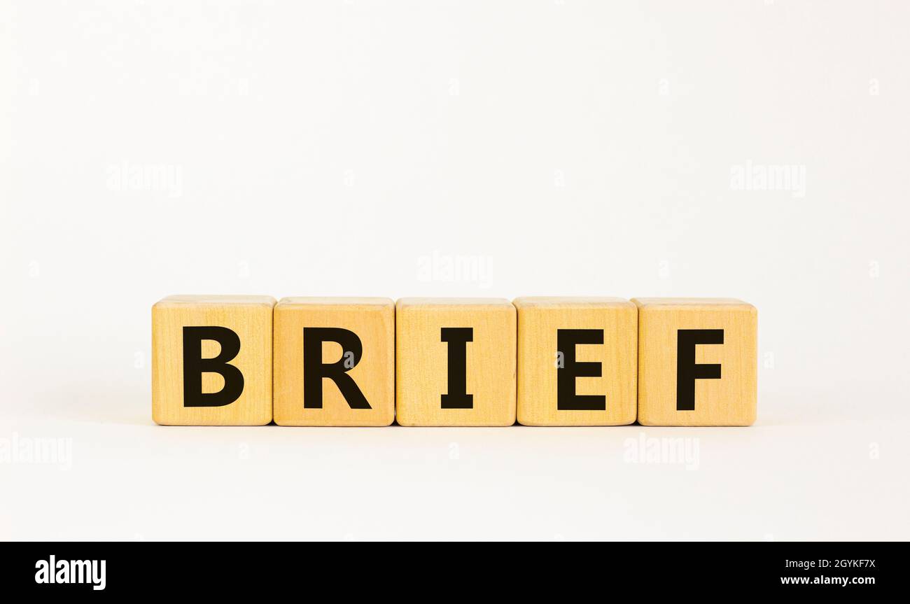 Brief symbol. The concept word 'brief' on wooden cubes on a beautiful ...