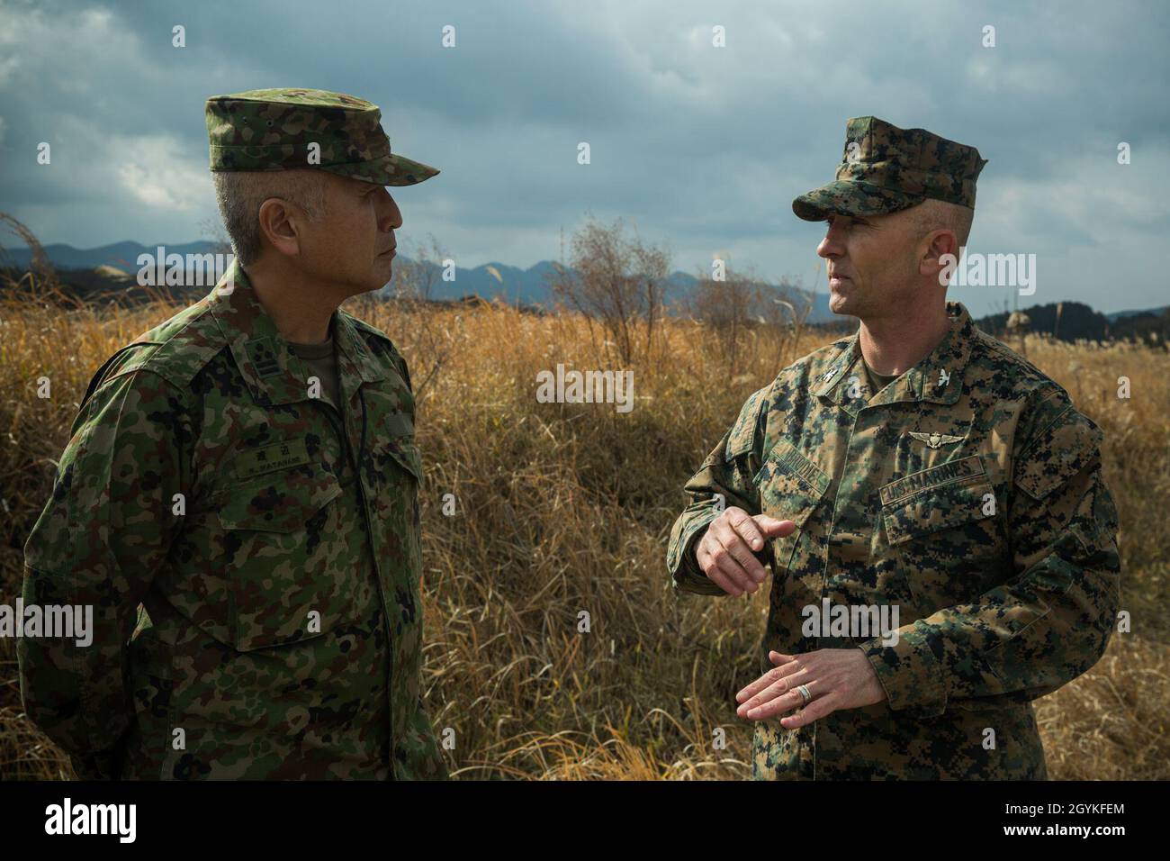 Japan Ground Self-Defense Force Col. Kouki Watanabe, left, commanding ...