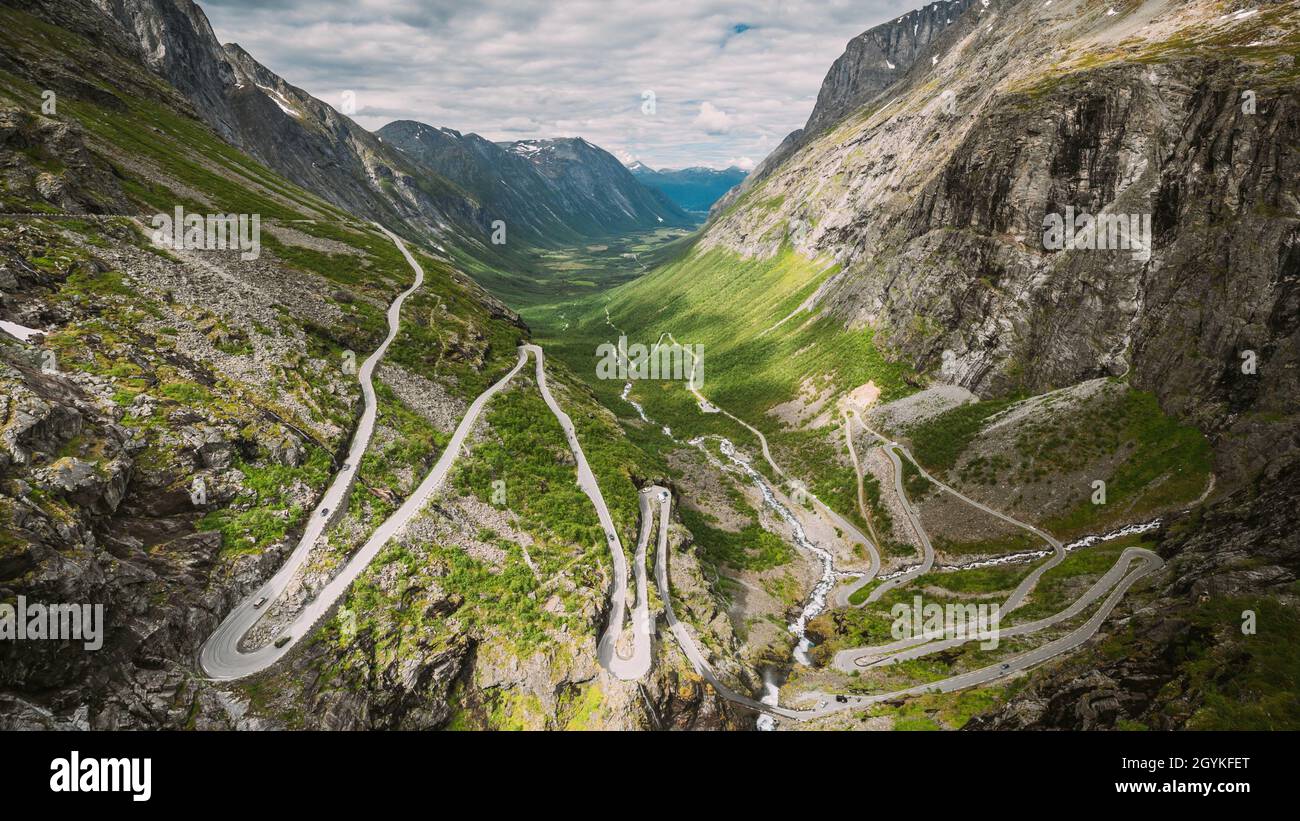 Trollstigen, Andalsnes, Norway. Cars Goes On Serpentine Mountain Road ...
