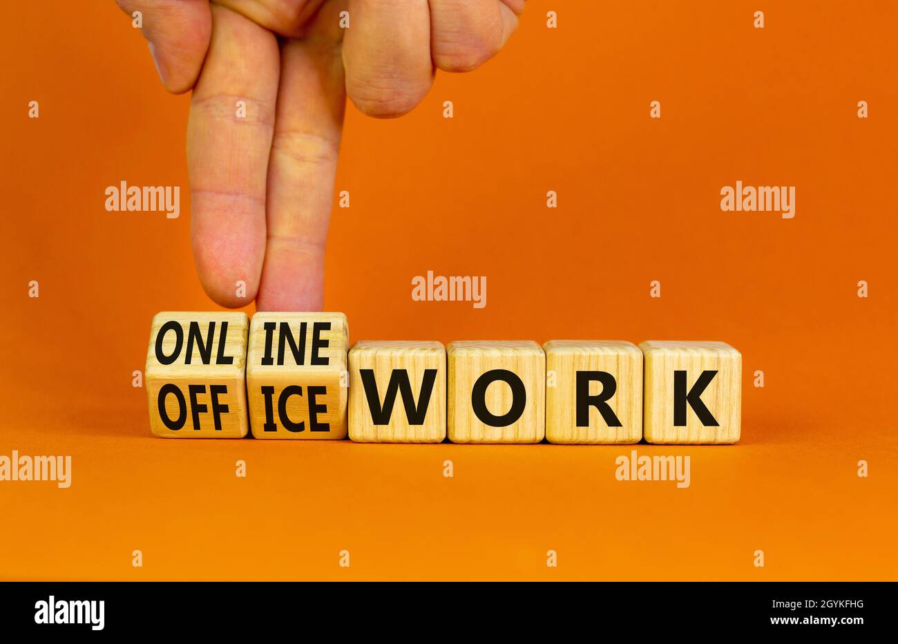 Office or online work symbol. Businessman turns cubes and changes words ...