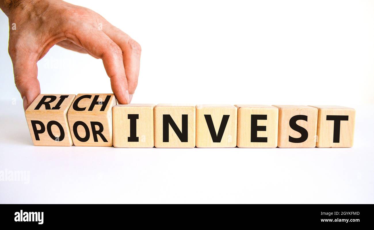 Rich or poor invest symbol. Businessman turns cubes and changes words ...