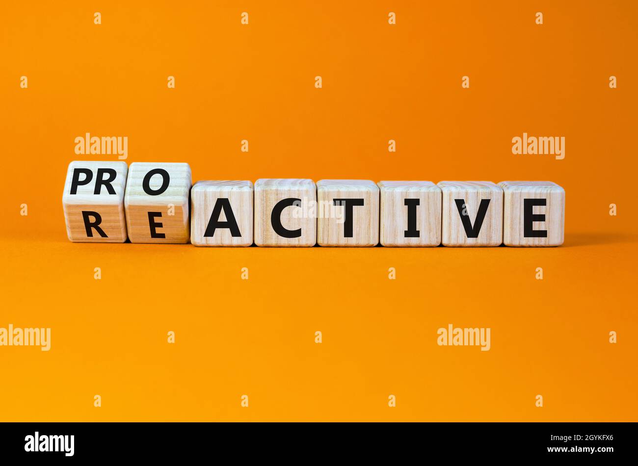 Reactive or proactive symbol. Turned wooden cubes and changed the word ...