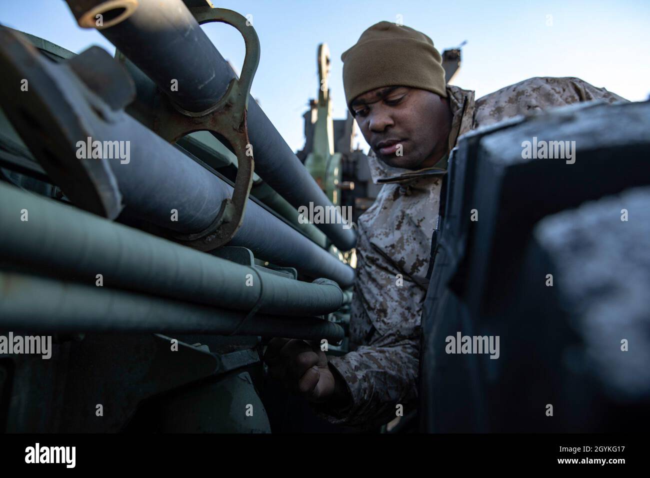 U.S. Marine Corps Gunnery Sgt. Maurice Sabater tightens a bolt during ...