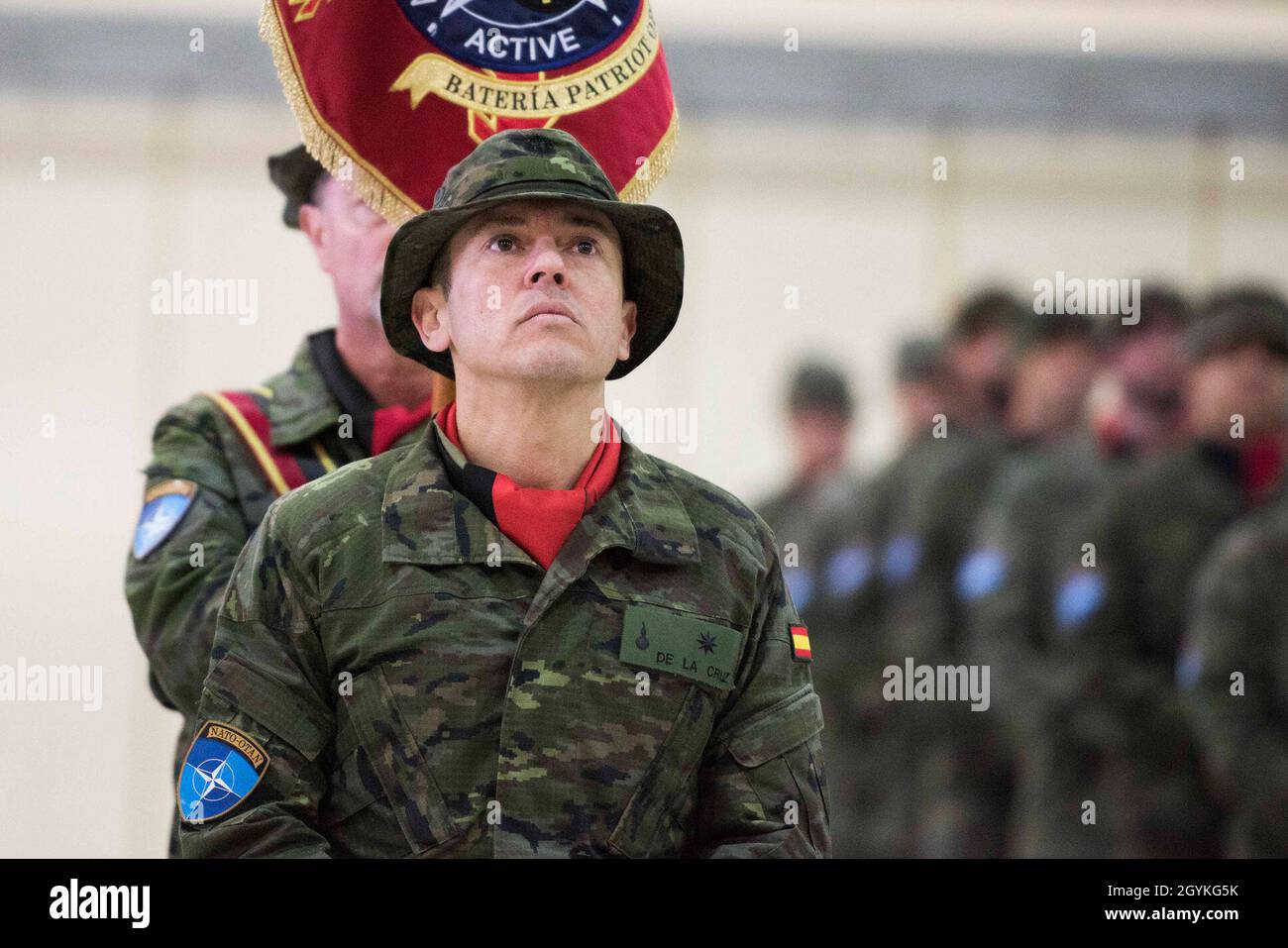 Spanish troops stand in formation during a change of command ceremony ...