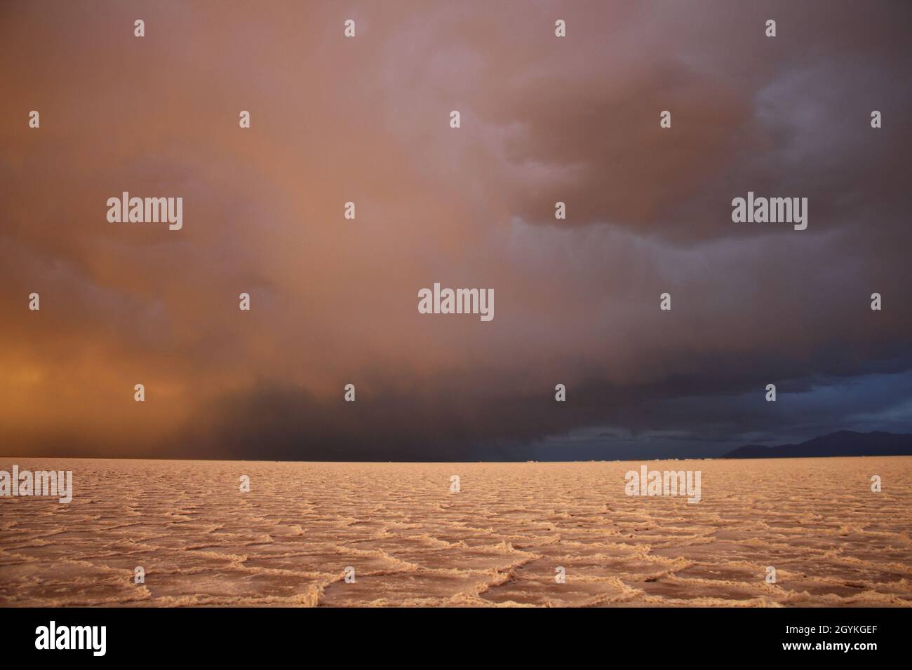 Storm at salt flat desert on sunset Stock Photo - Alamy