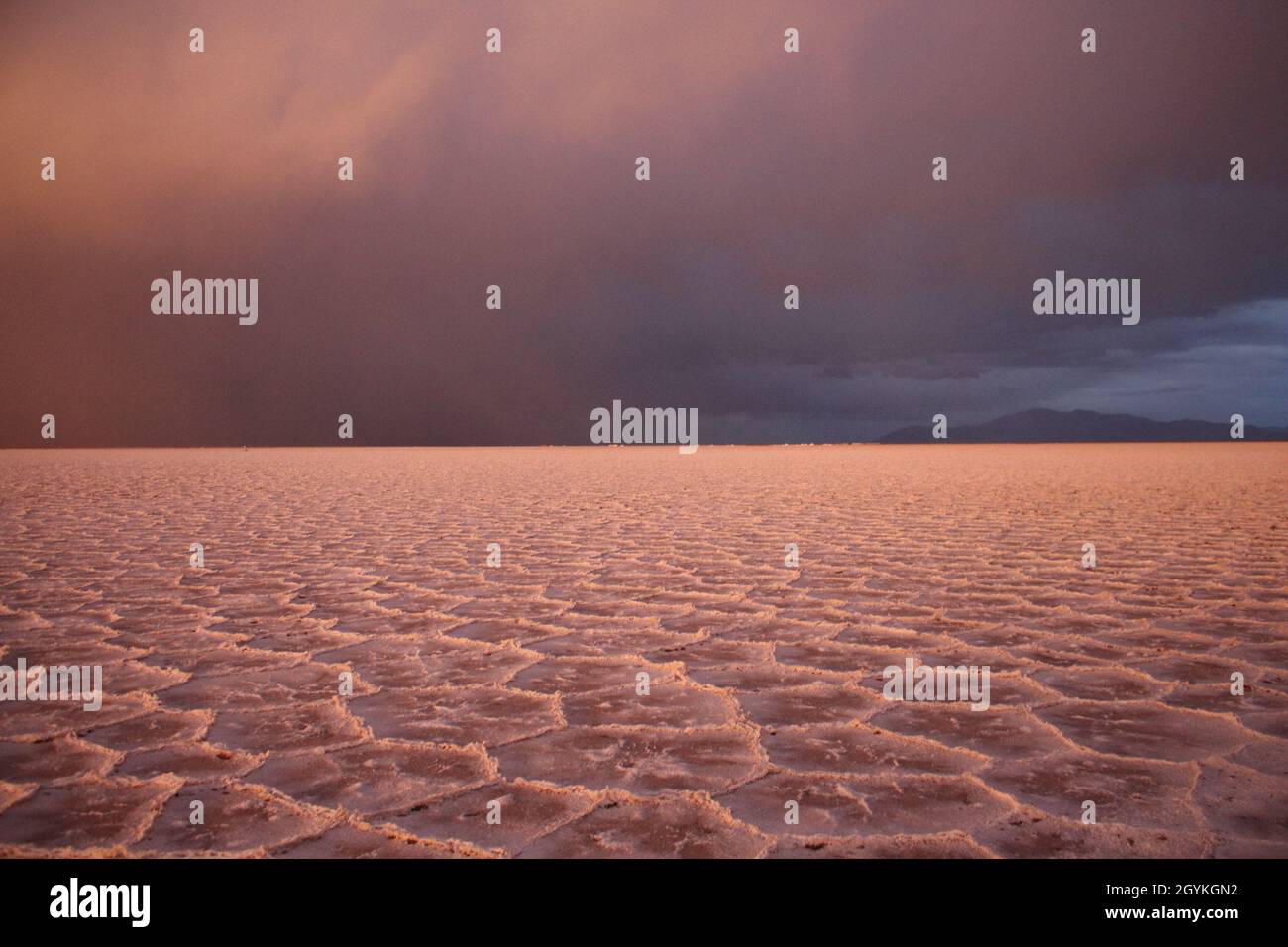 Storm at salt flat desert on sunset Stock Photo - Alamy