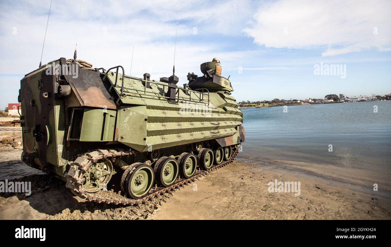 U.S. Marines with 3rd Assault Amphibian Battalion sit in an AAV-P7/A1 ...