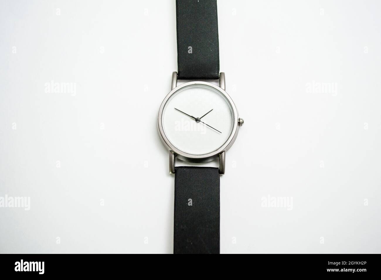 men's watch with a white dial. without numbers. isolated background ...