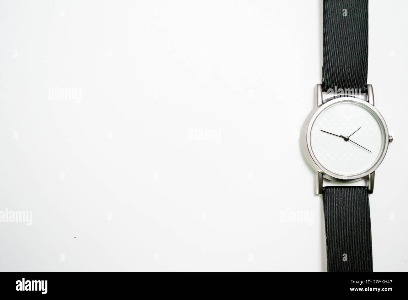men's watch with a white dial. without numbers. isolated background ...