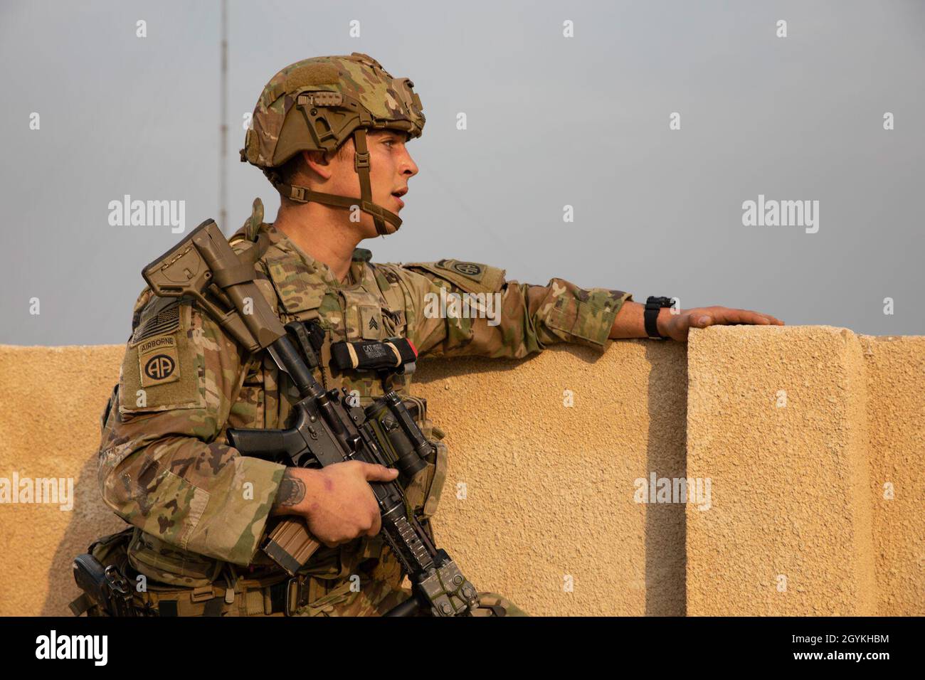 A U.S. Army paratrooper assigned to the 82nd Airborne Division watches over his area of ...