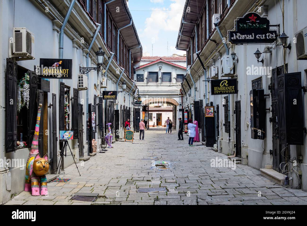 Bucharest, Romania - 6 May 2021: "Hanul cu tei" old building with small ...