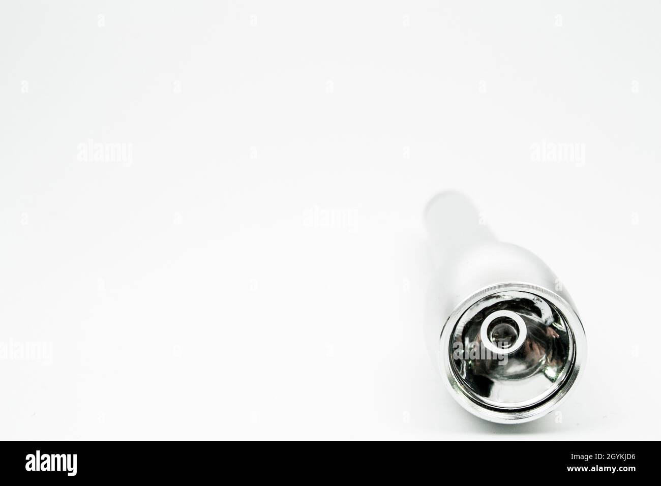 silver flashlight with isolated empty background Stock Photo - Alamy
