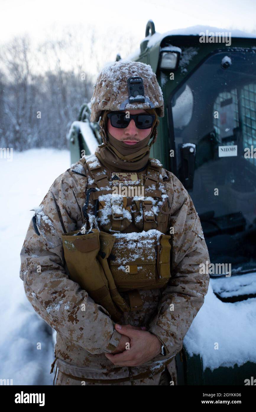 U.S. Marine Cpl. Elijah Ott, an Engineer Equipment Operator from 4th ...