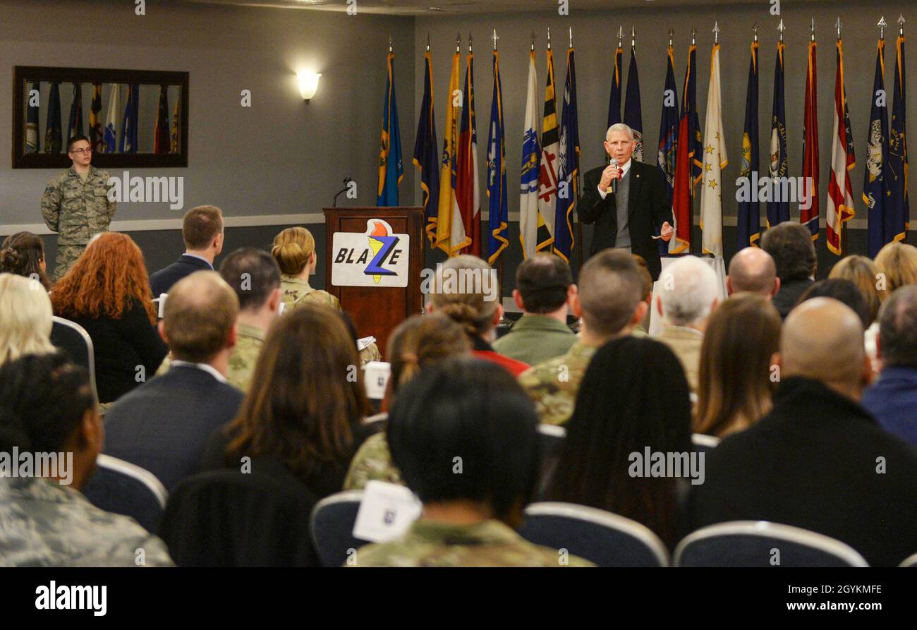 Retired Marine Corps Maj. Gen. Thomas Moore speaks to those in ...