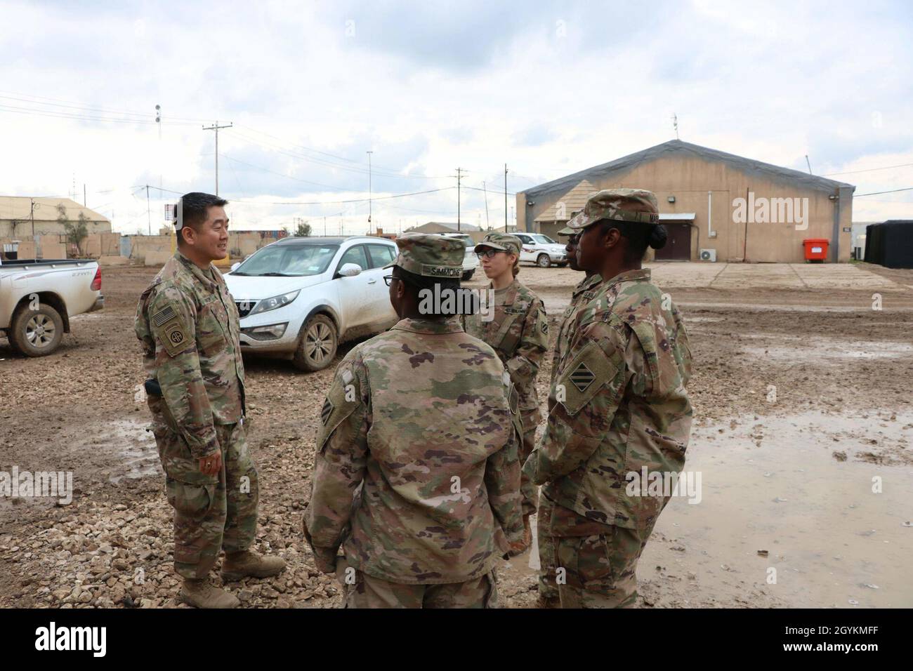Col. Jake S. Kwon, commander 77th Sustainment Brigade, visits with ...
