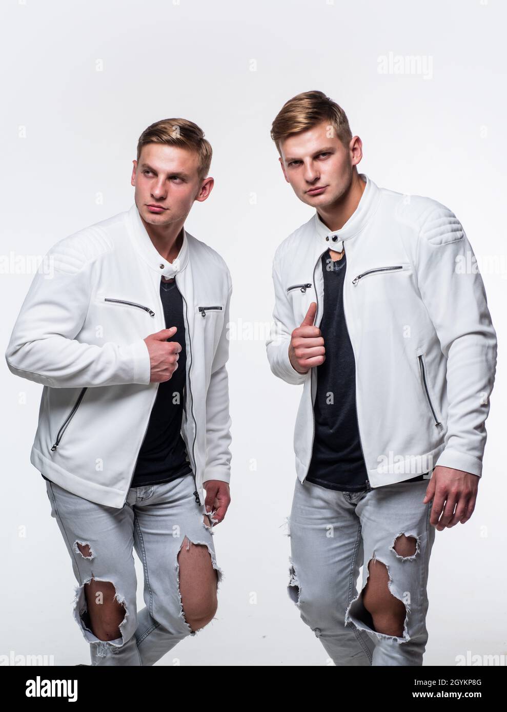 Guys wear casual outfit. young confident brothers. confident fashion ...