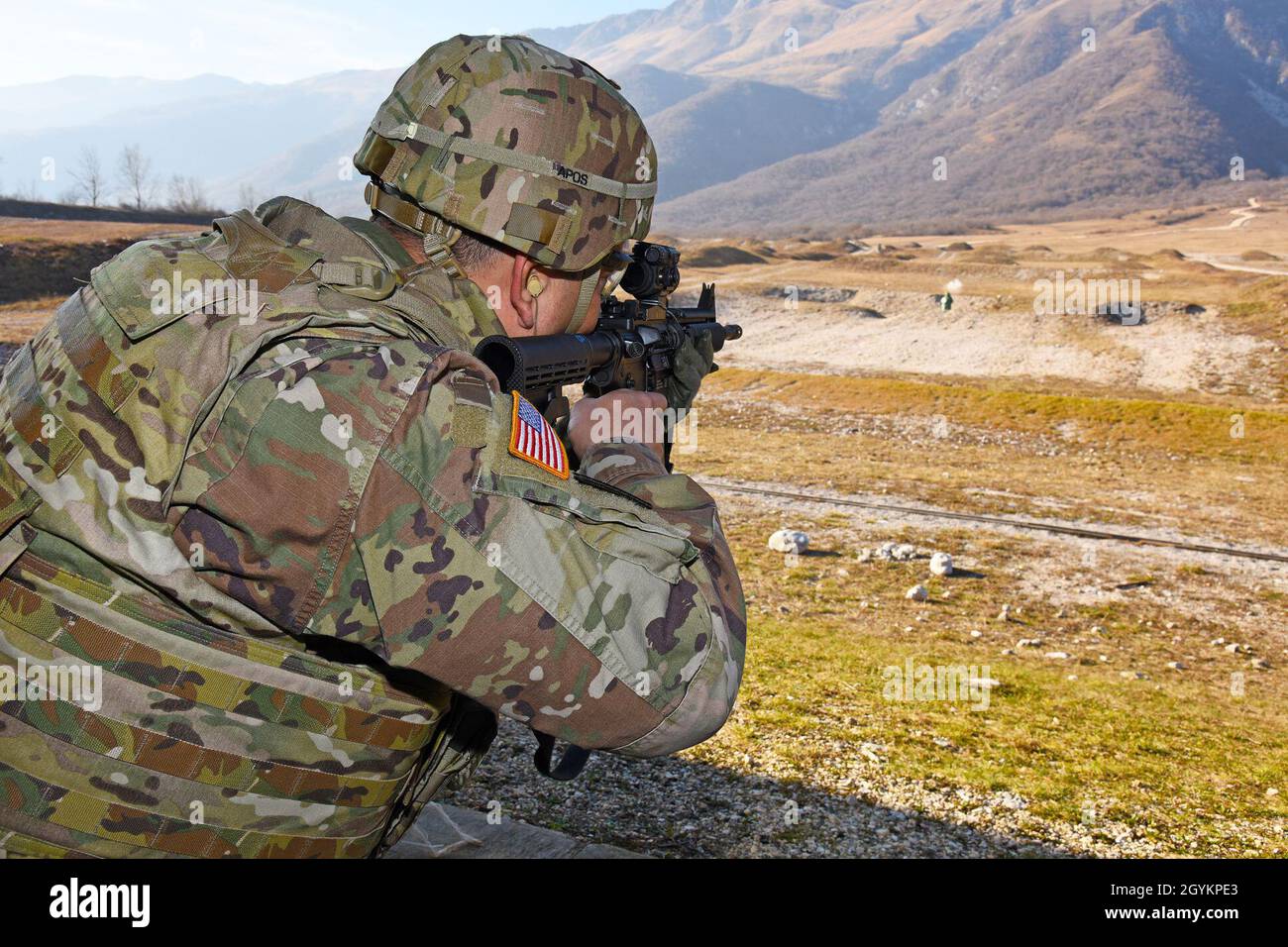 A U.S. Army Paratrooper assigned to the 173rd Airborne Brigade engages ...