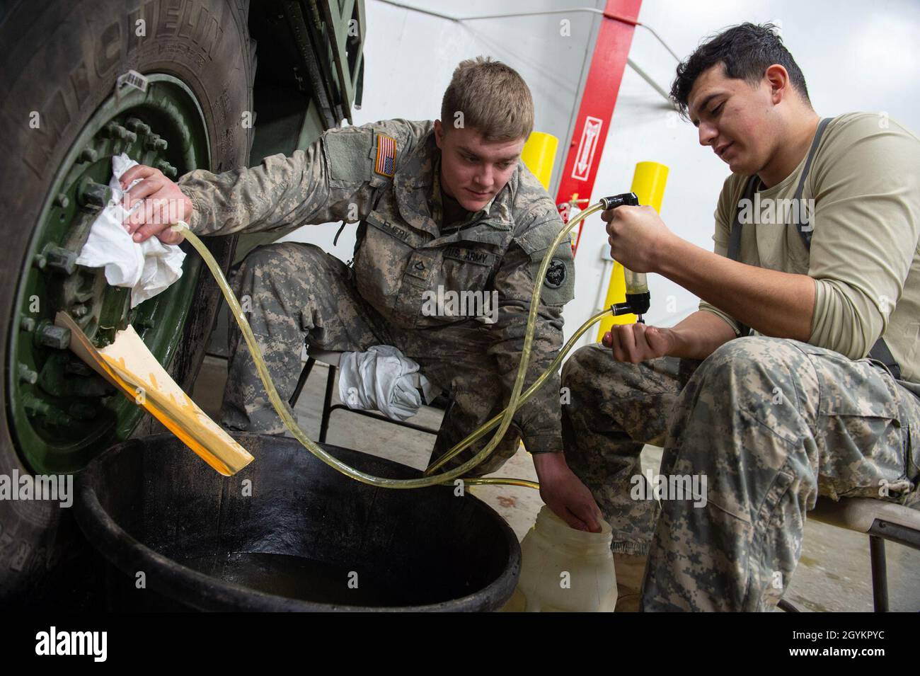 Army Pfc. Merlin Emery, left, and Spc. Luis Gonzalez, both assigned to ...