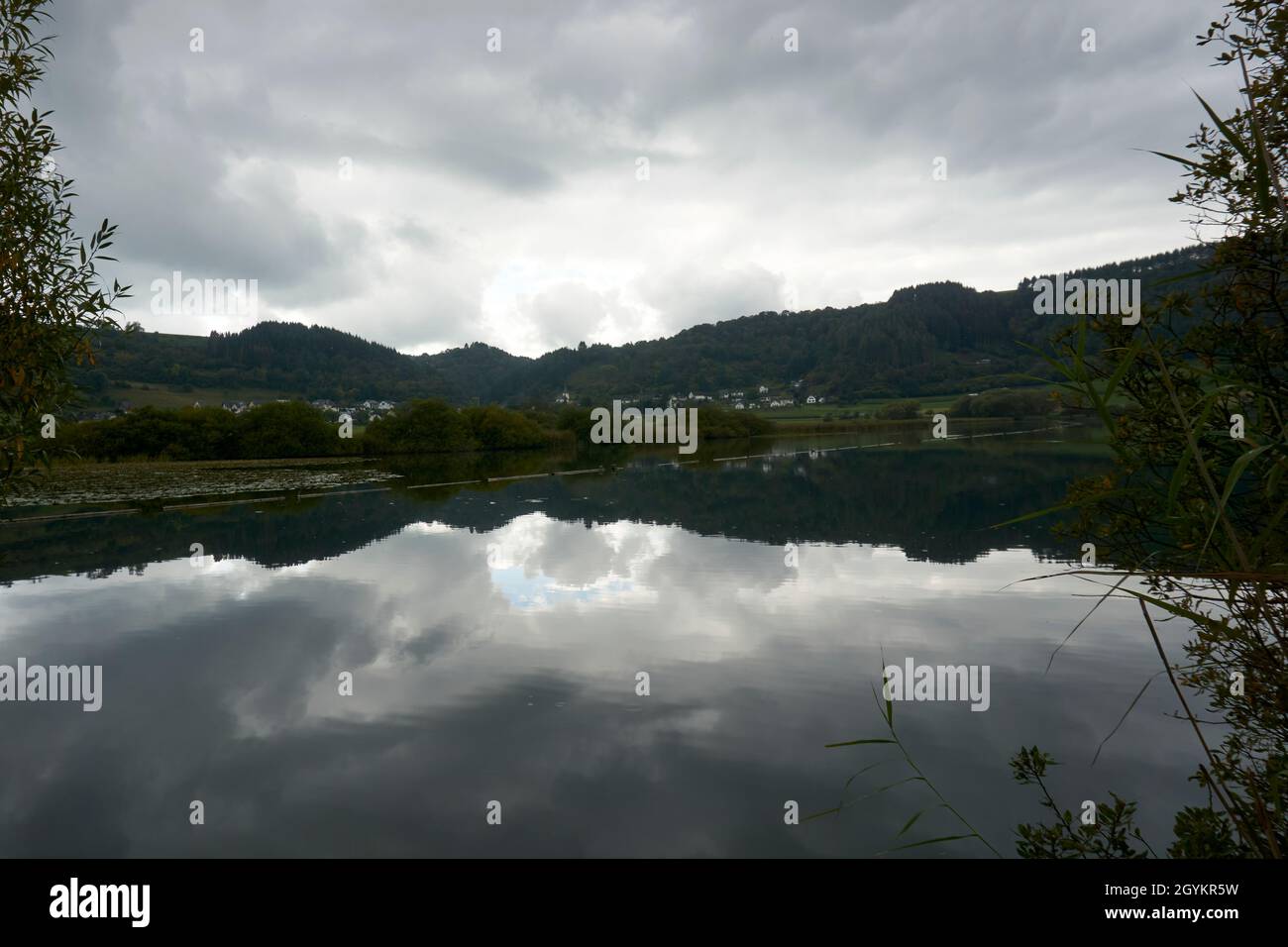 Photo of a crater lake, maar in autumn in germany Stock Photo - Alamy