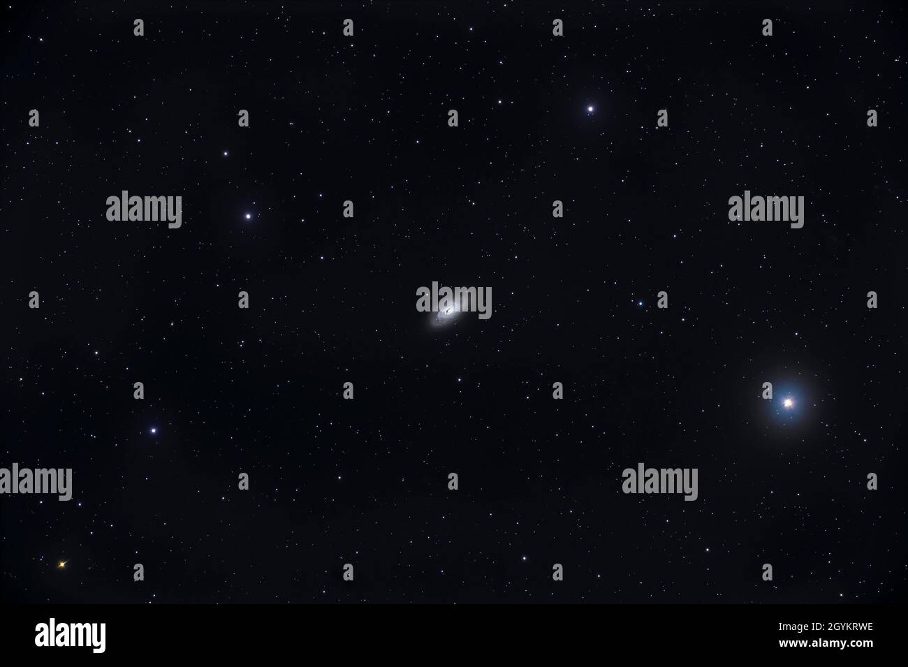 The bright galaxy Messier (M) 64 in Coma Berenices, aka the Black Eye ...