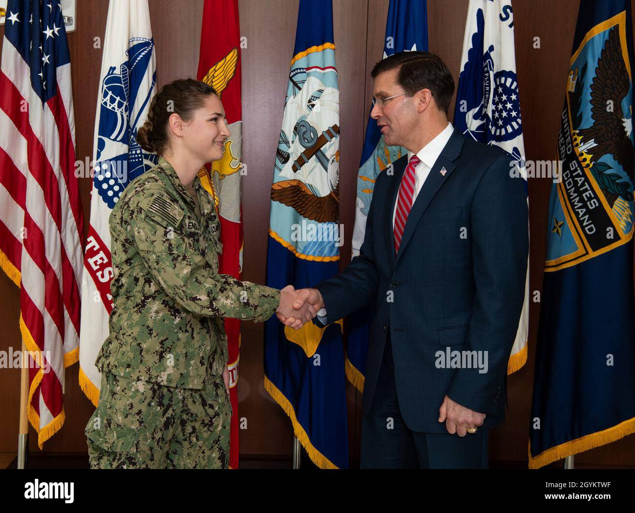 Defense Secretary Mark T. Esper presents U.S. Navy IS2 England with a ...