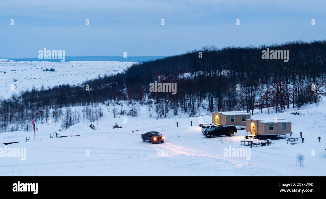 A member of the 21st Special Tactics Squadron walks back to his ...