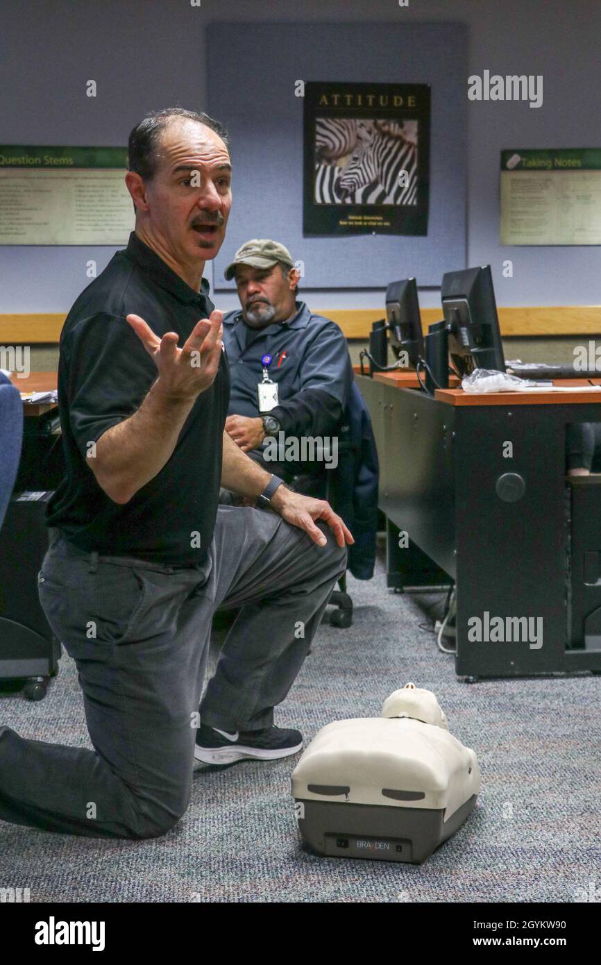 An instructor from the American Red Cross trains Devens RFTA employees ...