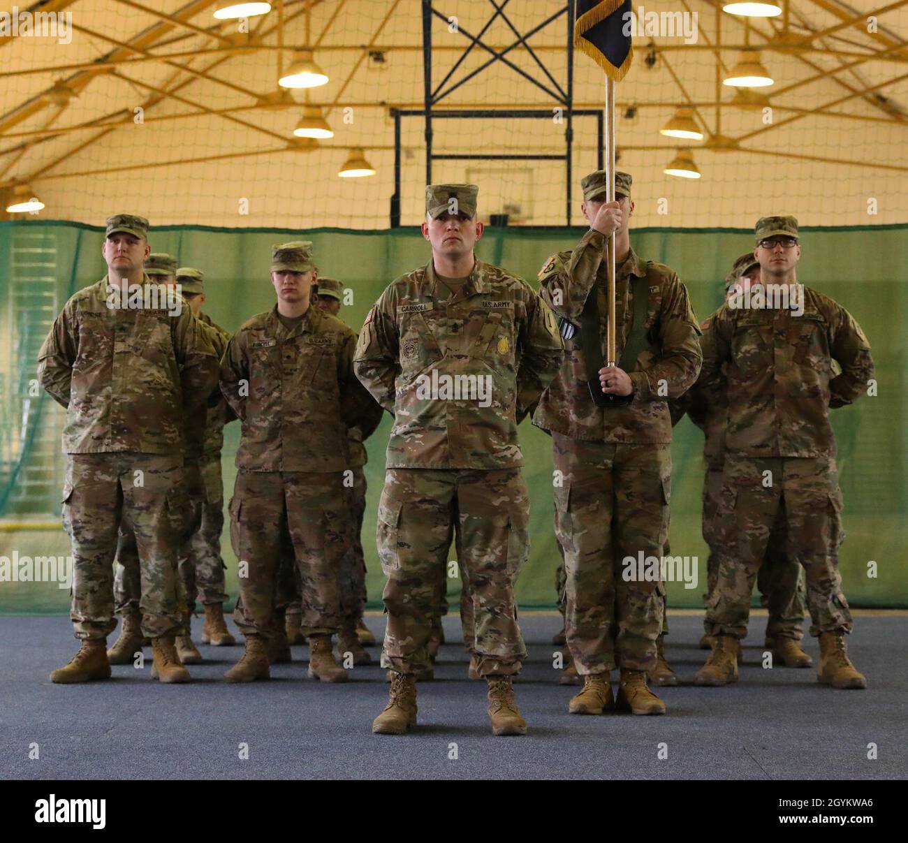 Soldiers stand in formation as part of a Change of Responsibility ...