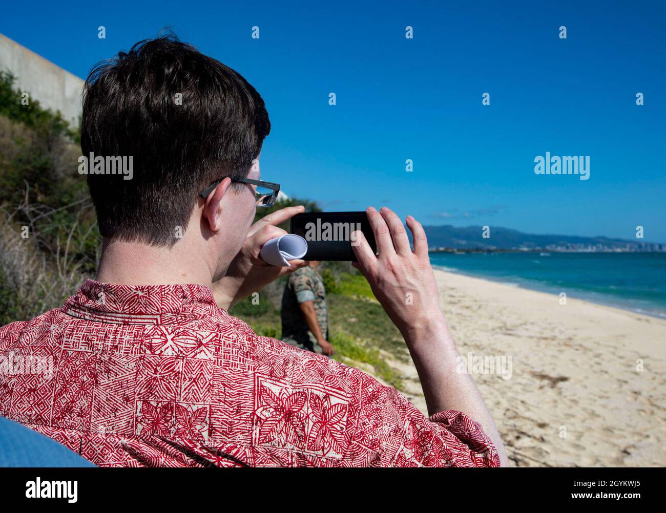 Tim Nelson, staff for Representative Ed Case, (D-HI), takes a photo ...