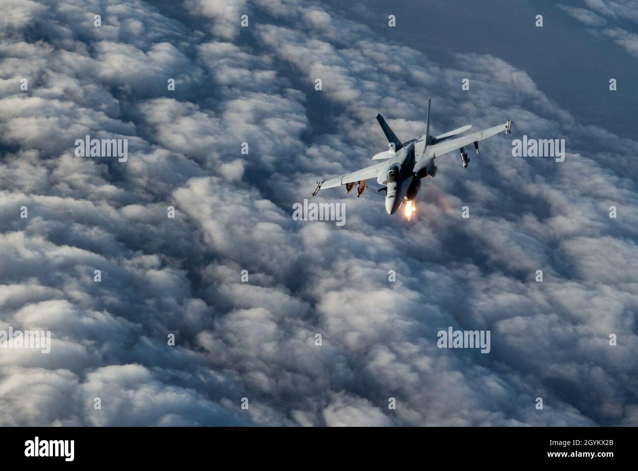 A U.S. Navy F/A-18E Super Hornet releases flares over Afghanistan, Jan ...