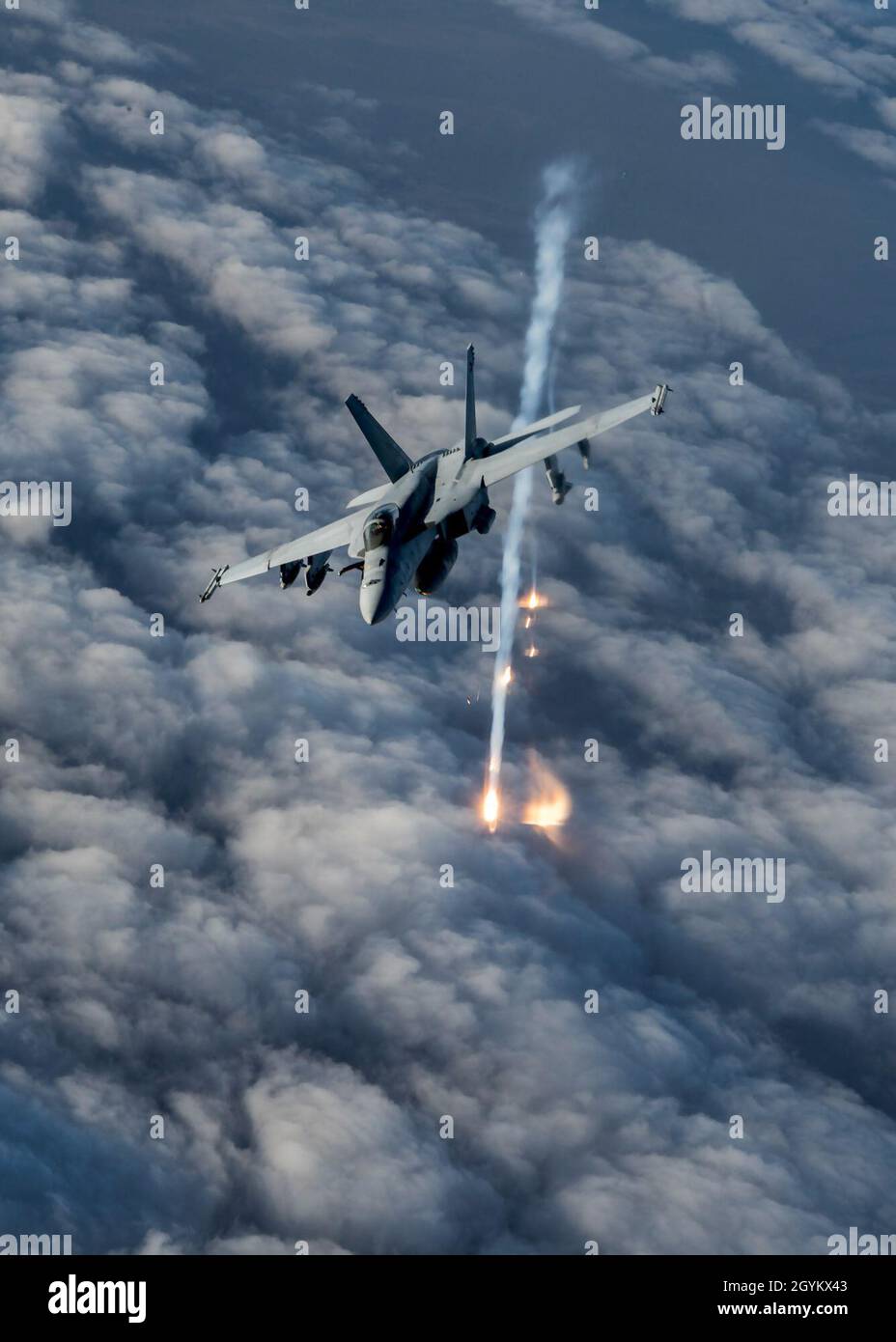 A U.S. Navy F/A-18E Super Hornet releases flares over Afghanistan, Jan ...