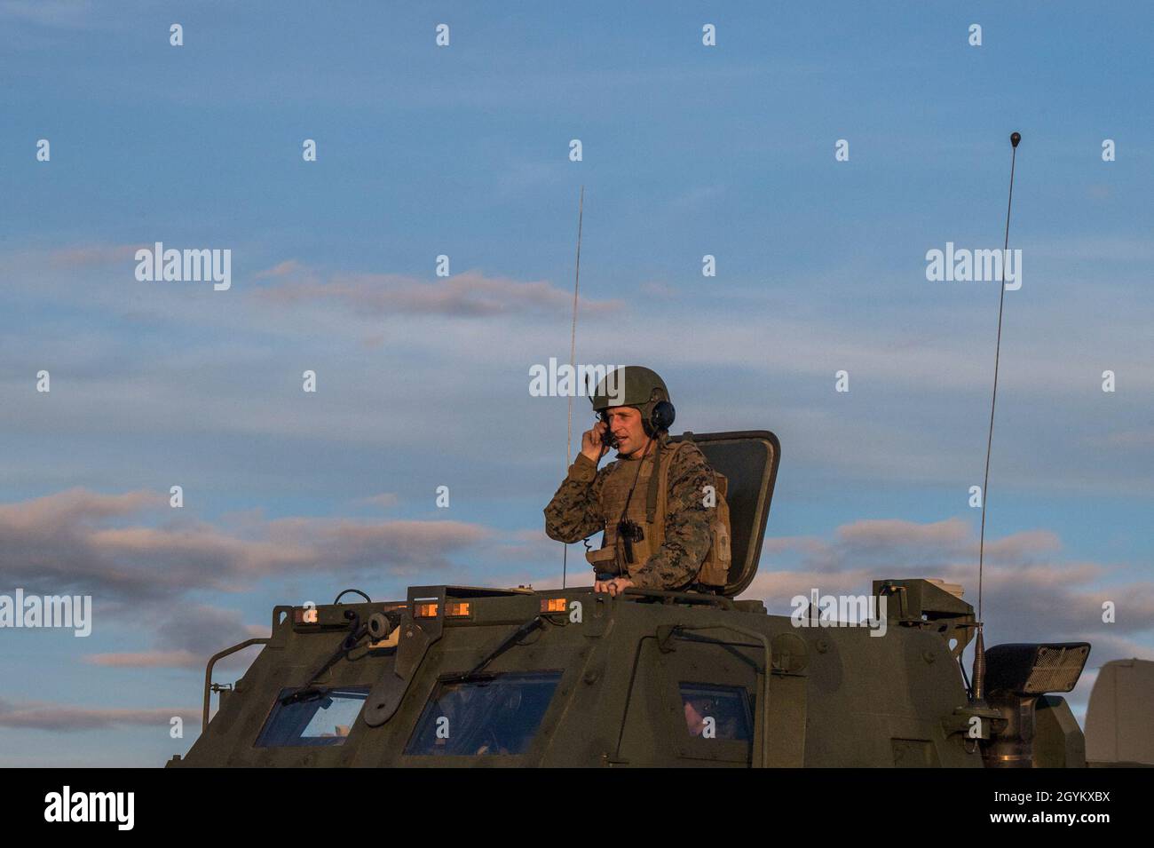 A U.S. Marine radios his Master Sergeant while preparing the M142 High ...