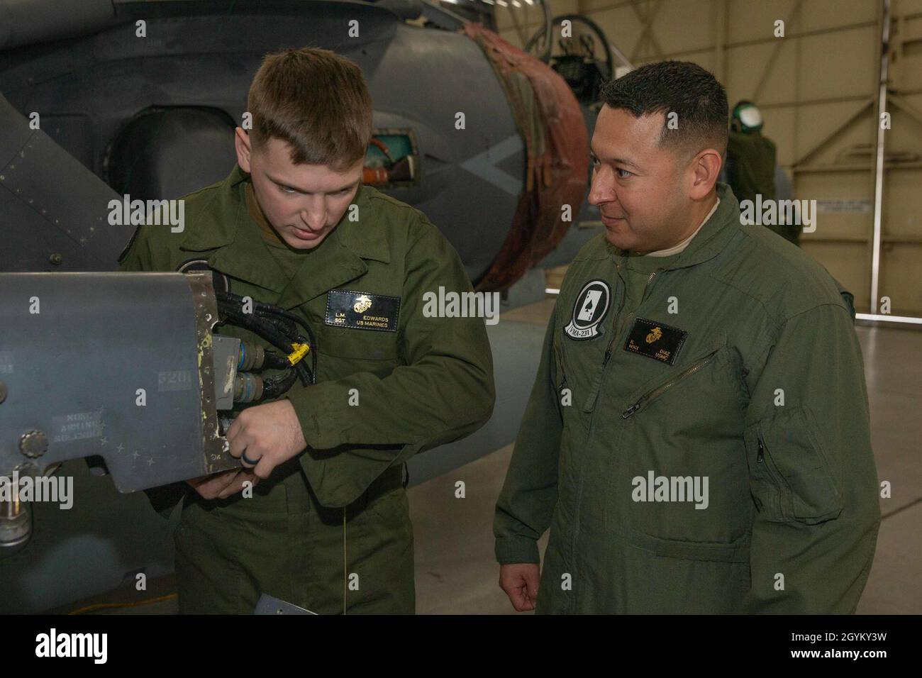 Marine Sgt. Logan Edwards, left, speaks with Master Sgt. Ruben Diaz ...