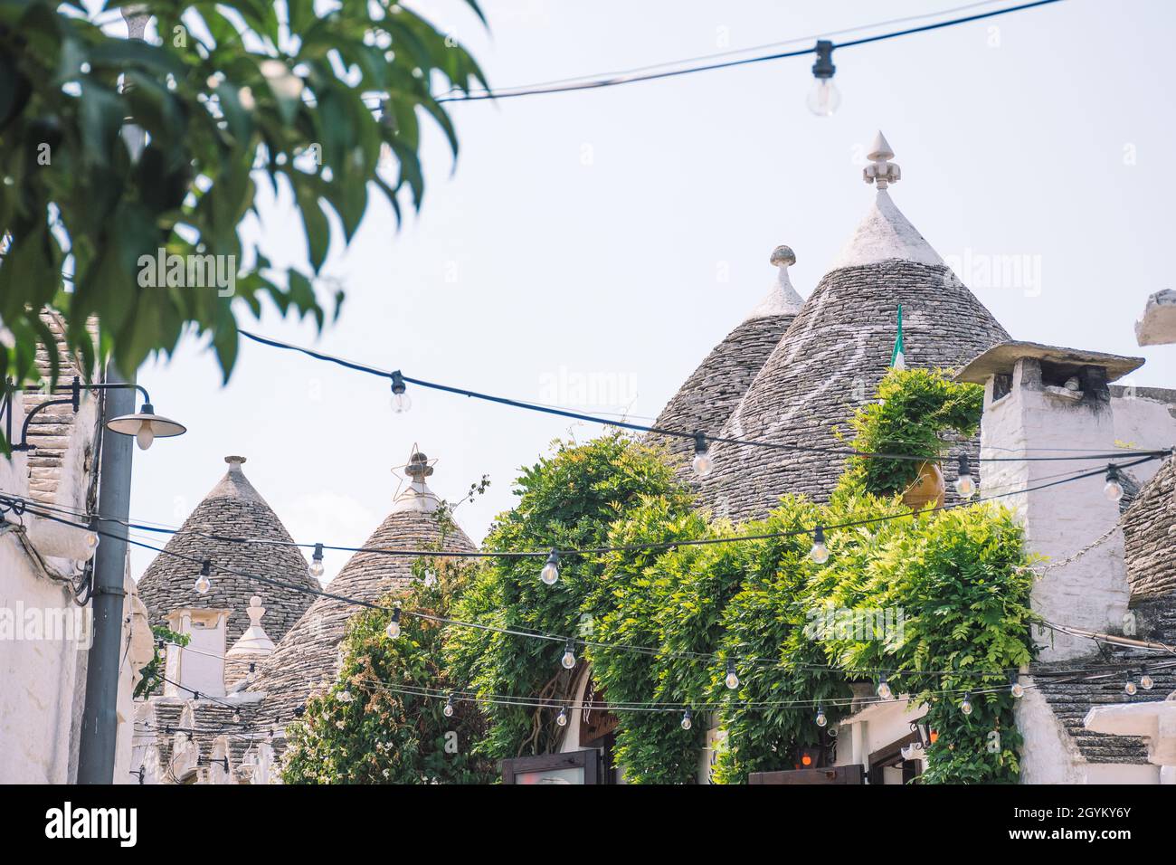 Group of beautiful Trulli, traditional Apulian dry stone wall hut old ...