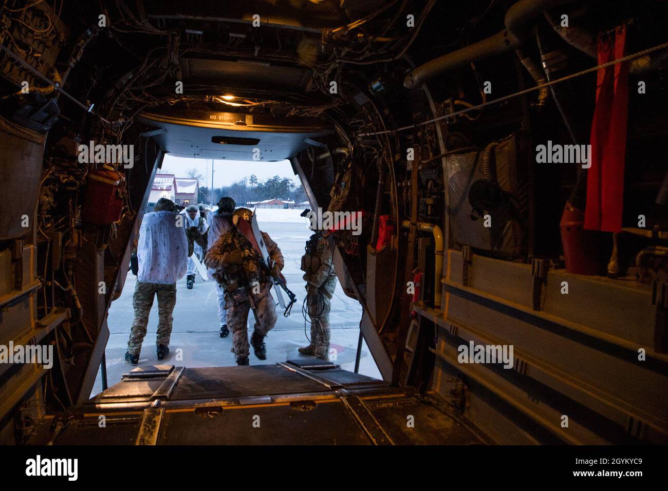 U.S. Navy SEALs board a U.S. Air Force CV-22 Osprey assigned to the 8th ...
