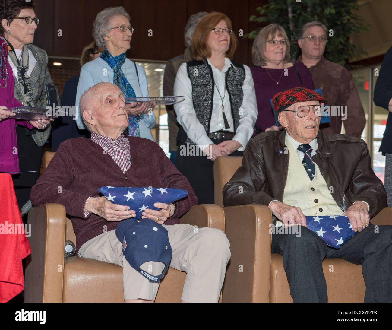 Seated left to right, WW II & Korean War veterans Robert Fahey and ...
