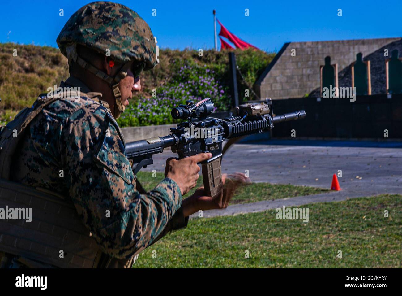 A U.S. Marine with headquarters company, 3rd Marine Regiment, executes ...