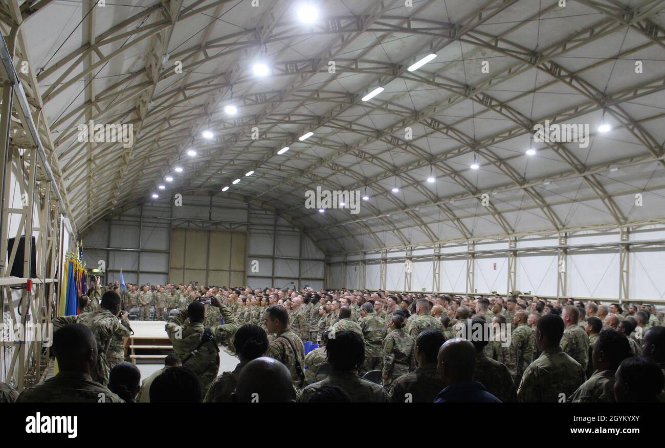 Graduates and attendees of the Basic Leadership Course 20-703 sing the ...
