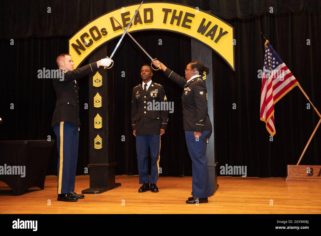BACH Sgt. DeMarcus Heath prepares to step through the arch of the ...