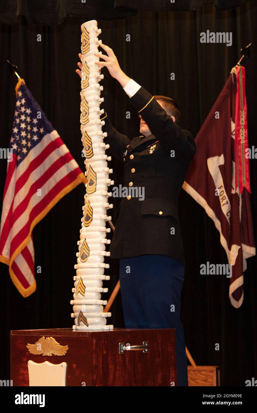 BACH Soldier of the Year Pfc. Austin Clayton, places the final piece ...
