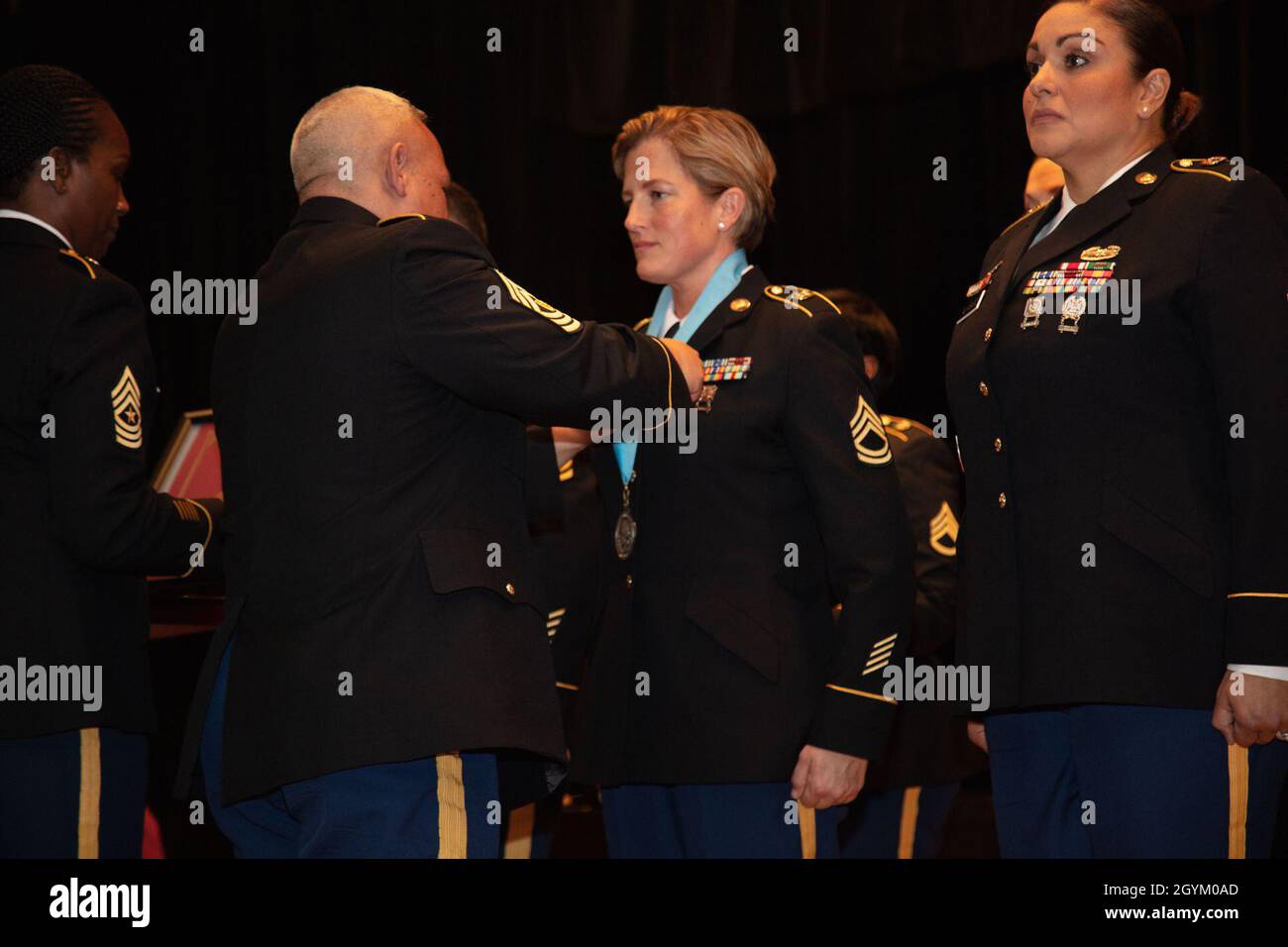 BACH Command Sgt. Major Daniel Santiago places a Sergeant Audie Murphy ...