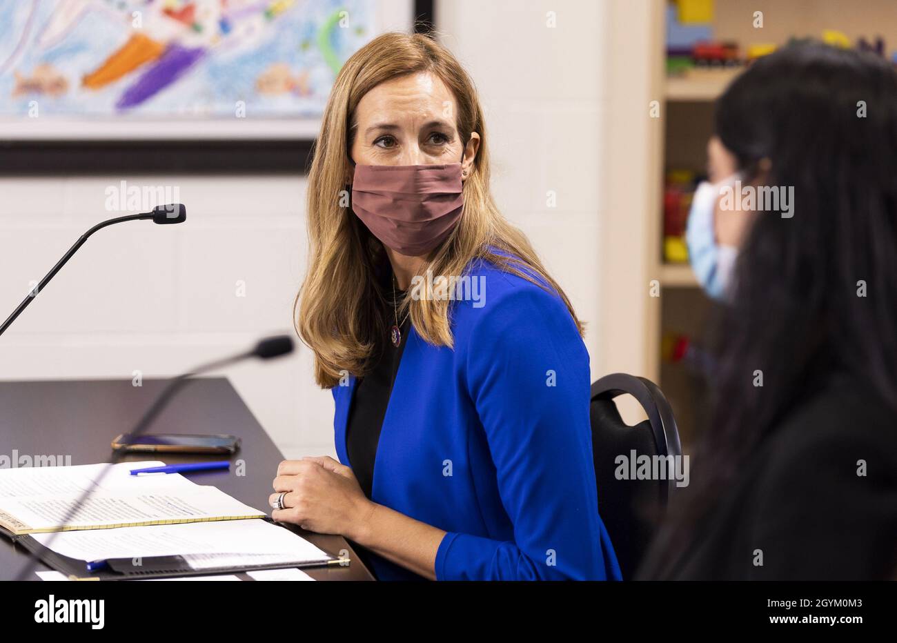 Little Falls, USA. 08th Oct, 2021. Democratic New Jersey Congresswoman Mikie Sherrill (C) talks ...
