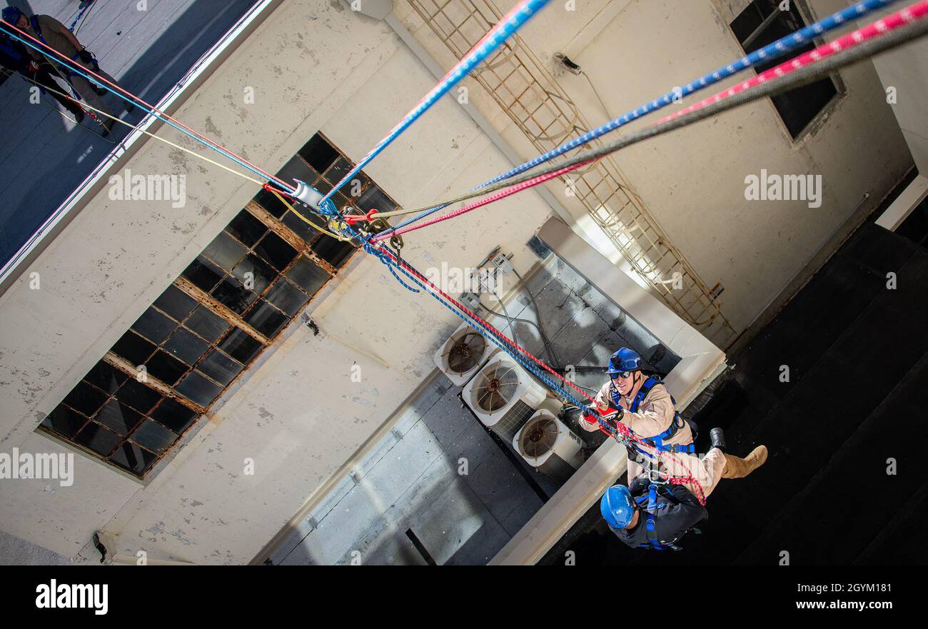 Chad Dewar, 96th Civil Engineer Squadron, recovers a simulated injured ...