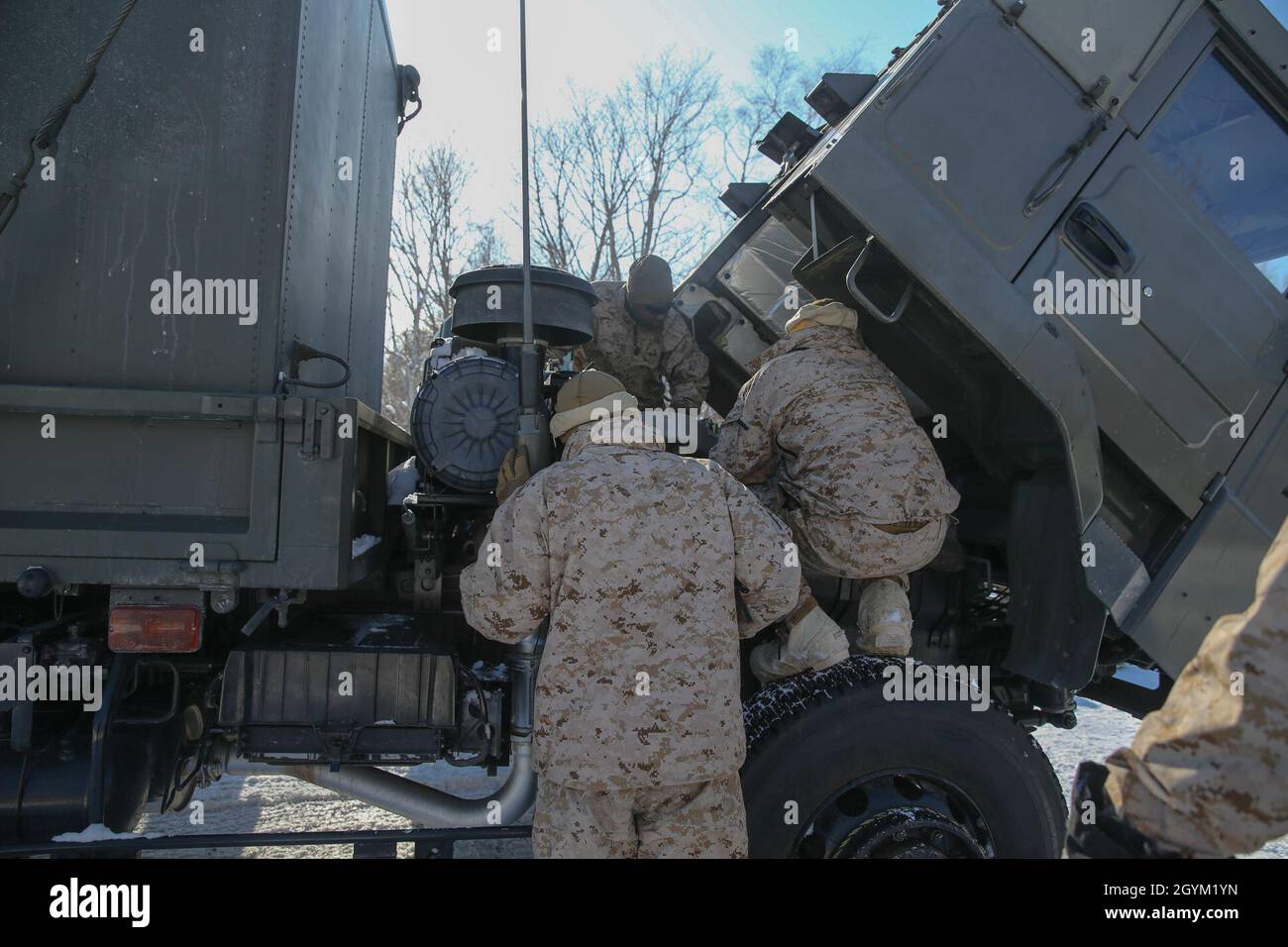 U.S. Marines from 4th Marines Ordnance Section, 3rd Light Armored ...