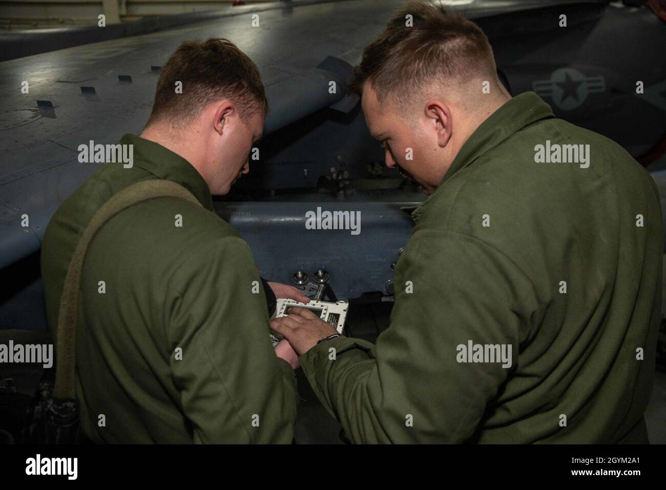 Marine Cpl. Andre Briefer Jr., left, and Lance Cpl. Chad Clevenger test ...