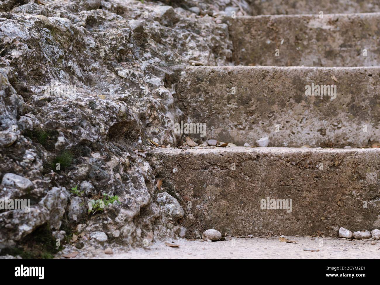 Stone stair in the mountain. several rocks. several loose rocks along ...