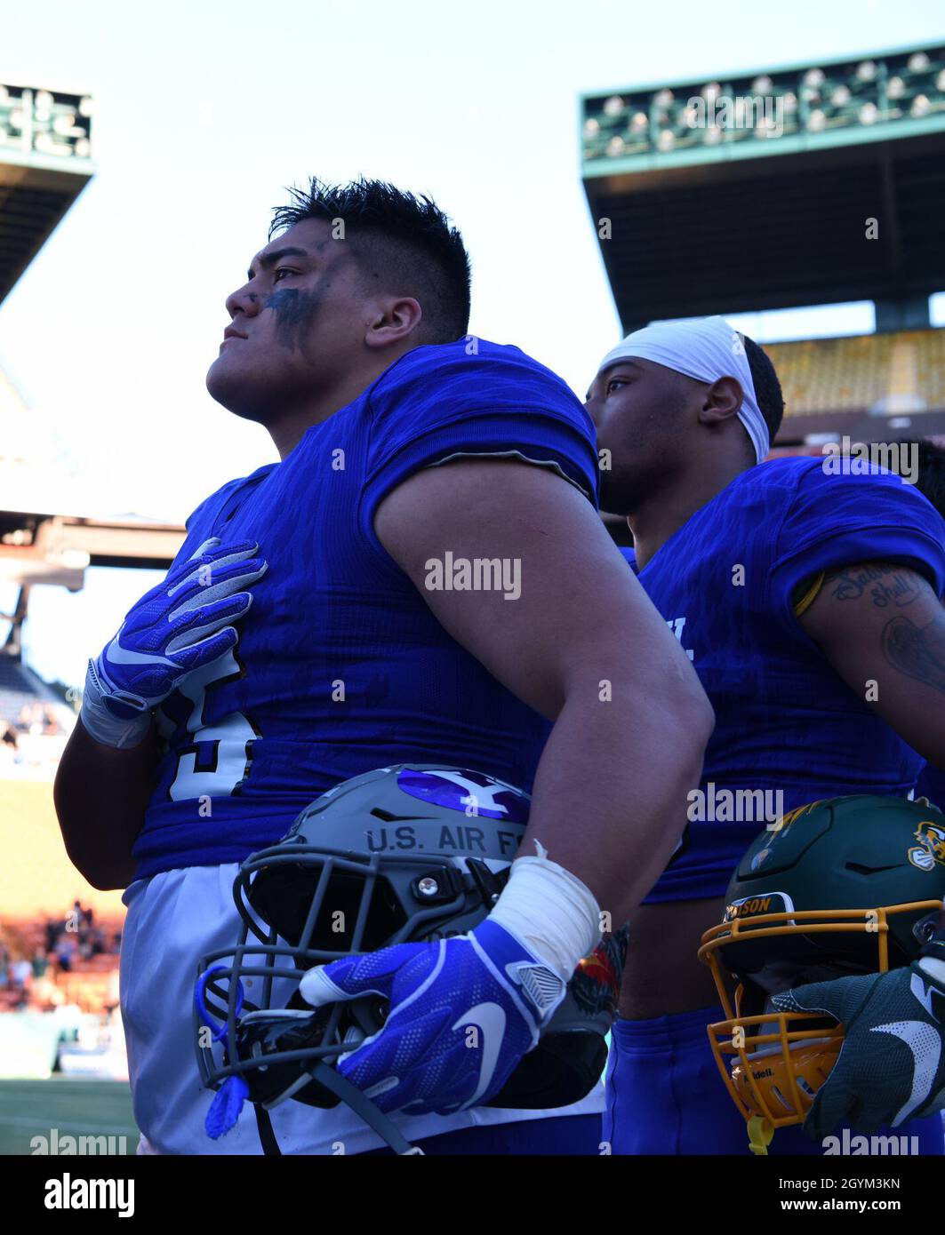 United States Air Force Academy cadet Mosese Fifita puts his hand on ...