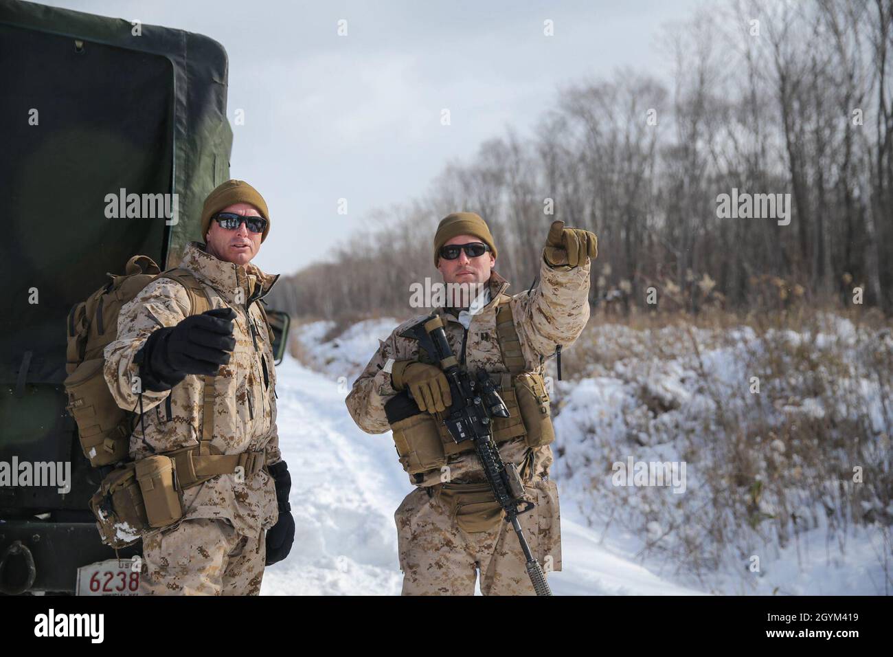 Col. Jason Perry (Left), the commanding officer of 4th Marine Regiment ...