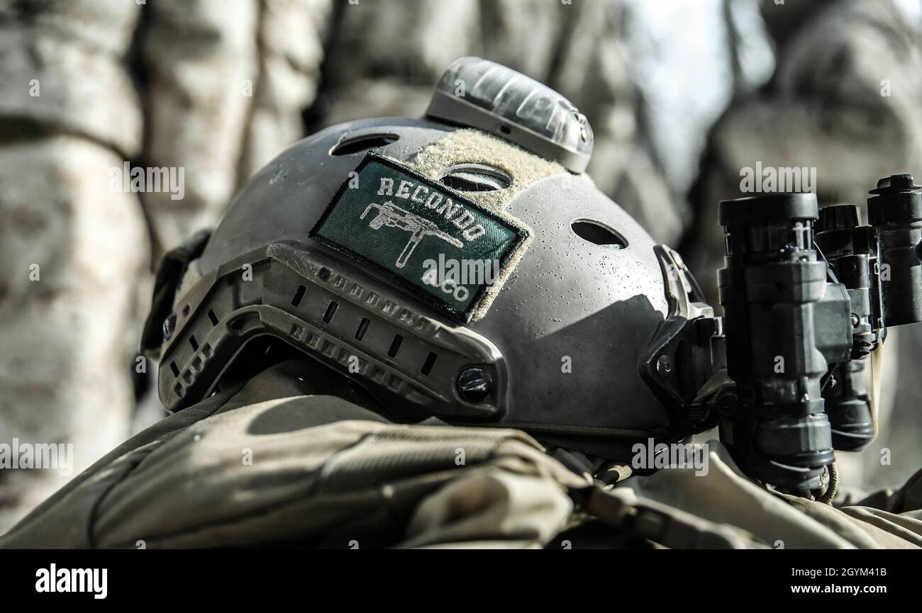 A U.S. Marine from 3rd Reconnaissance Battalion, 3rd Marine Division ...