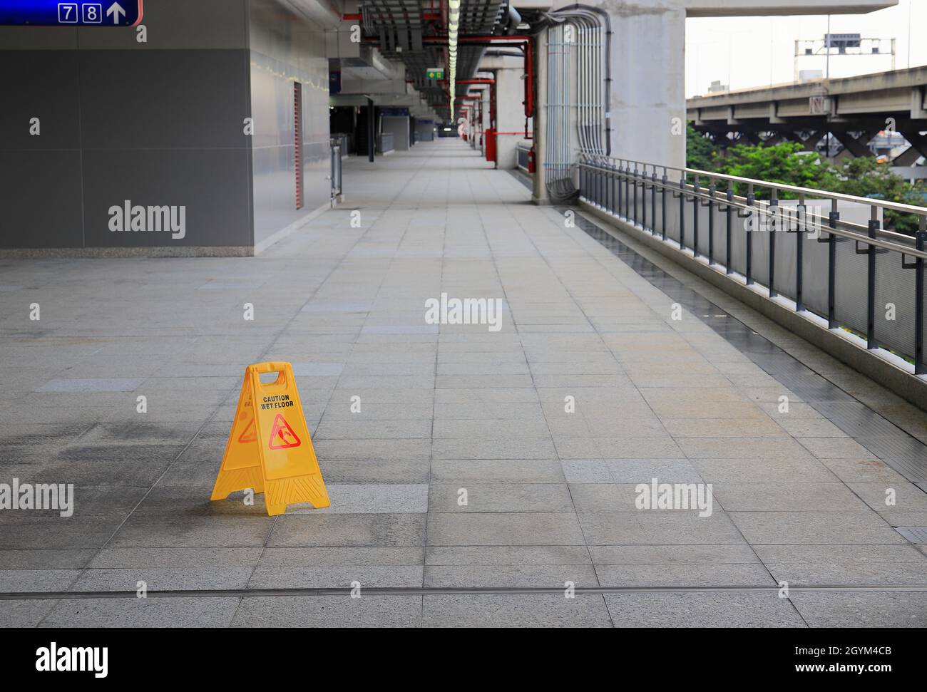 Sign showing warning of caution wet floor, Yellow sign that alerts for ...